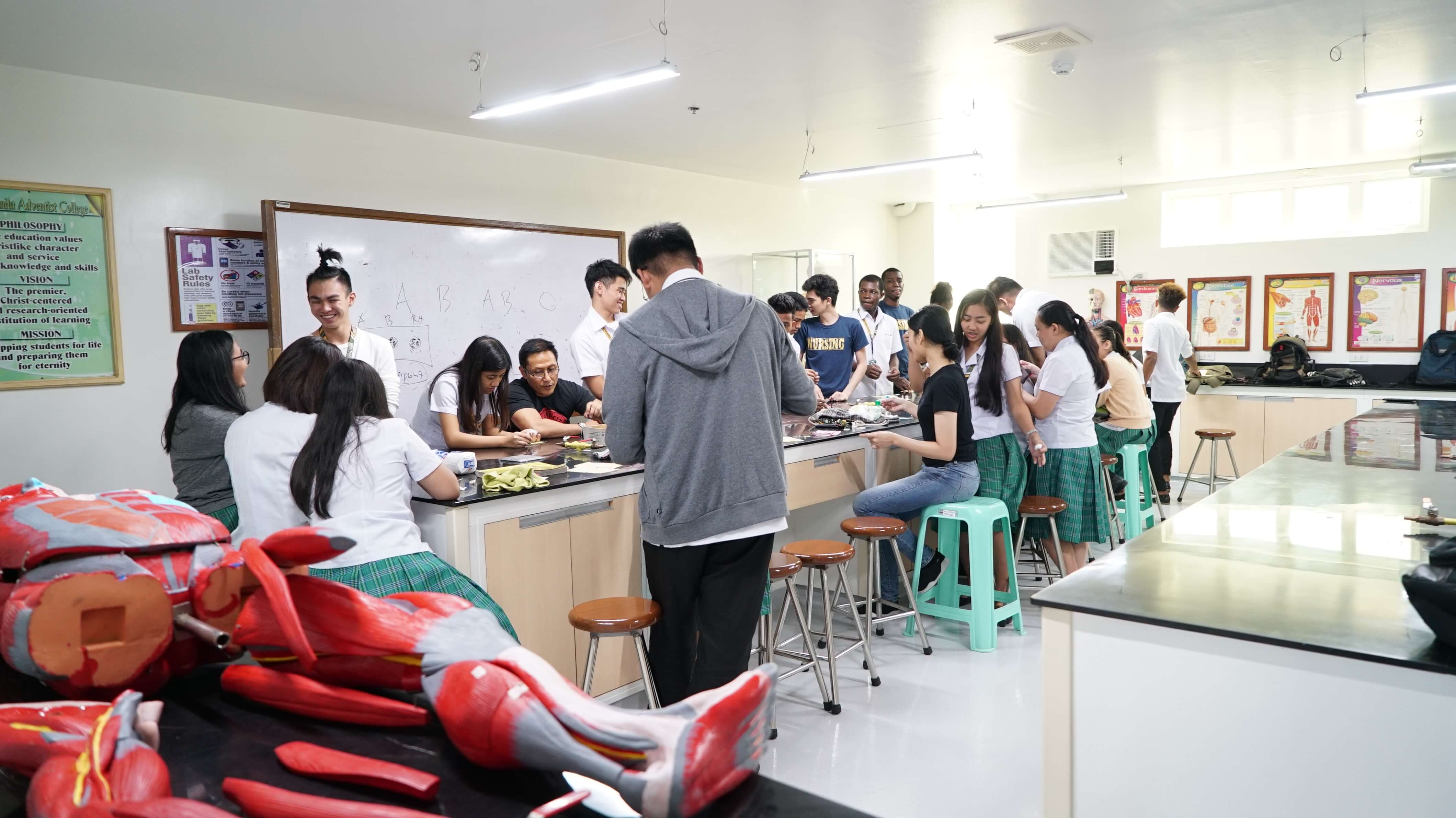 Manila Adventist College Logo